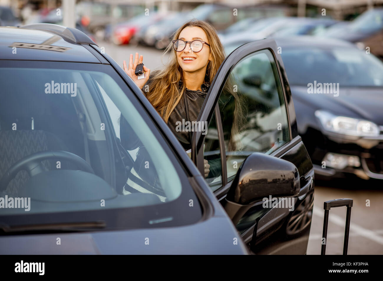 Woman renting a car Stock Photo - Alamy Woman renting a car Stock Photo - Alamy