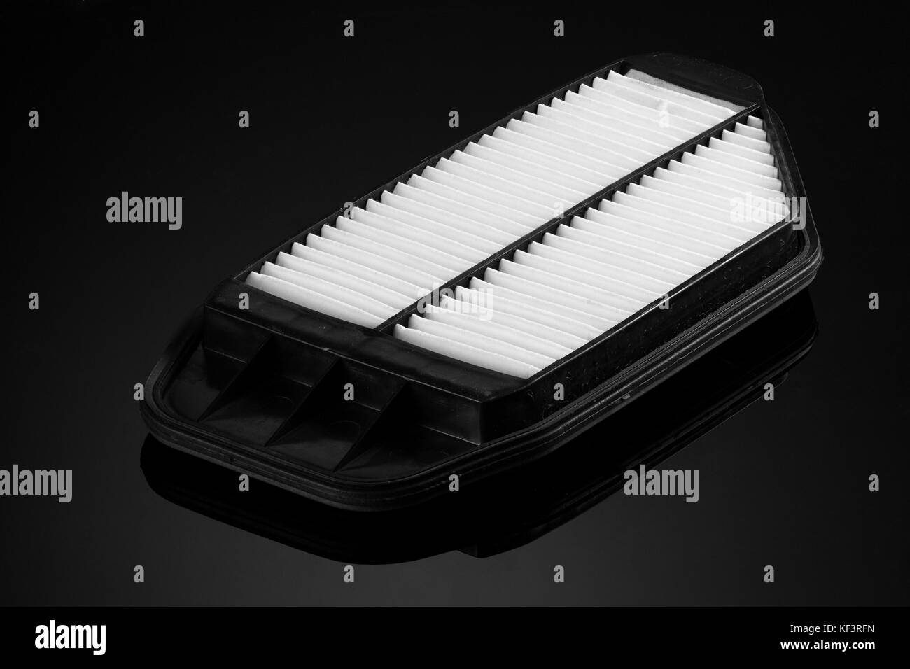 automotive filter square shape on a black background Stock Photo - Alamy
