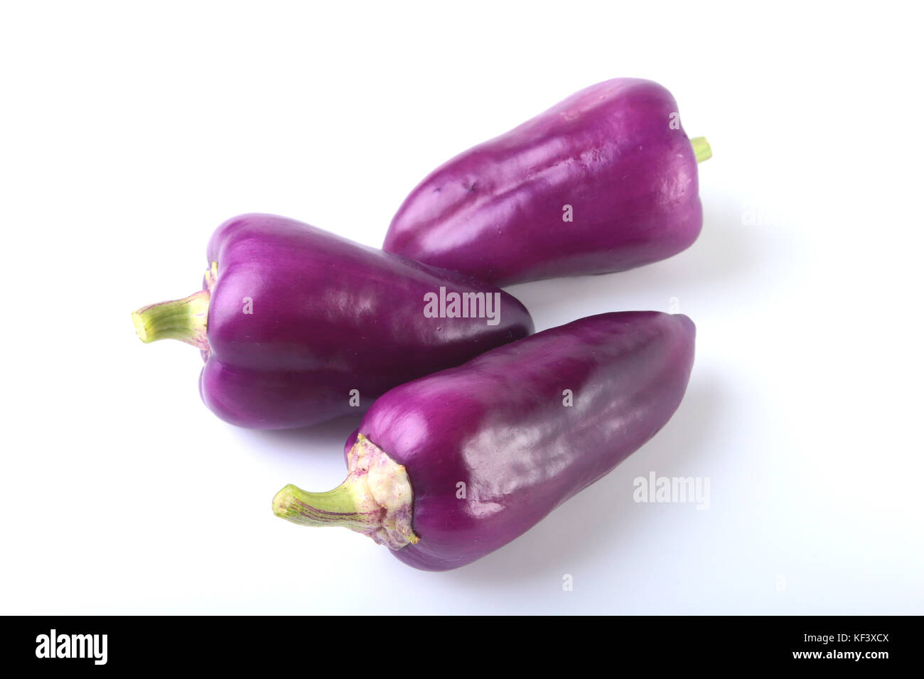 purple exotic color bell peppers isolated white background Stock Photo ...