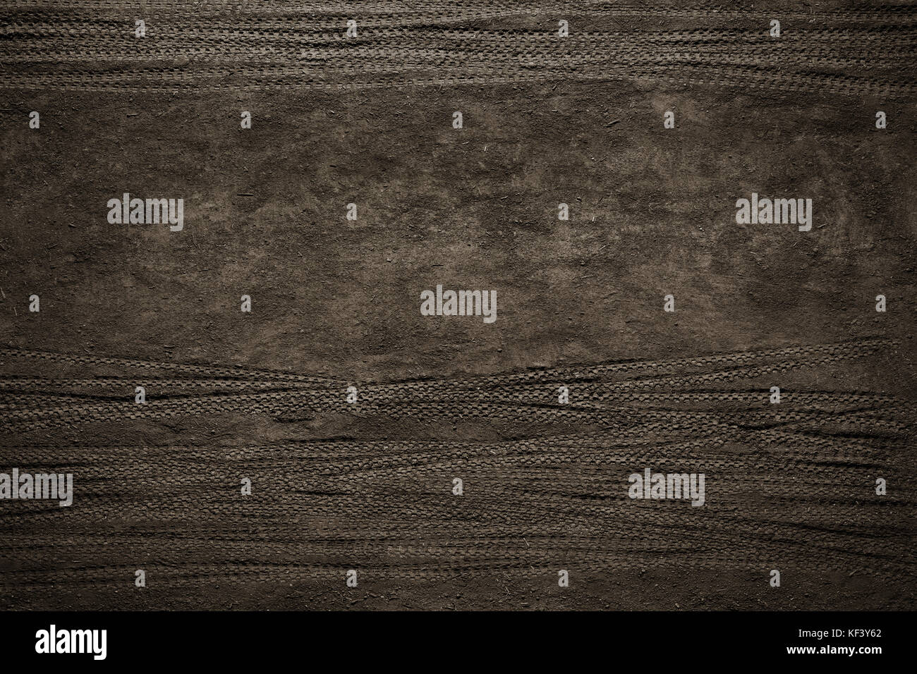 Overhead shot of vehicle tracks on dirt Stock Photo - Alamy