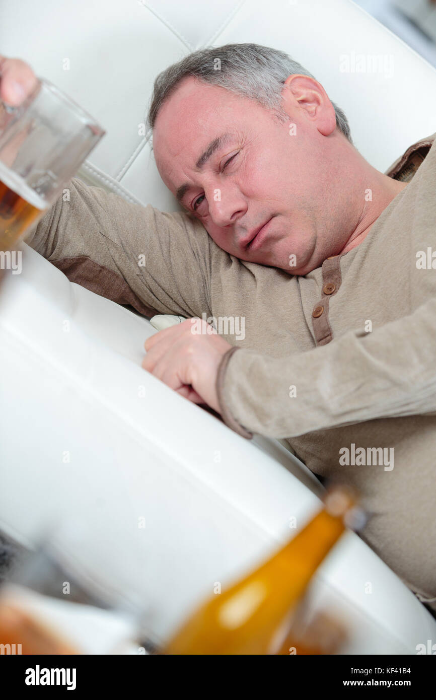 sad depressed alcoholic businessman Stock Photo - Alamy