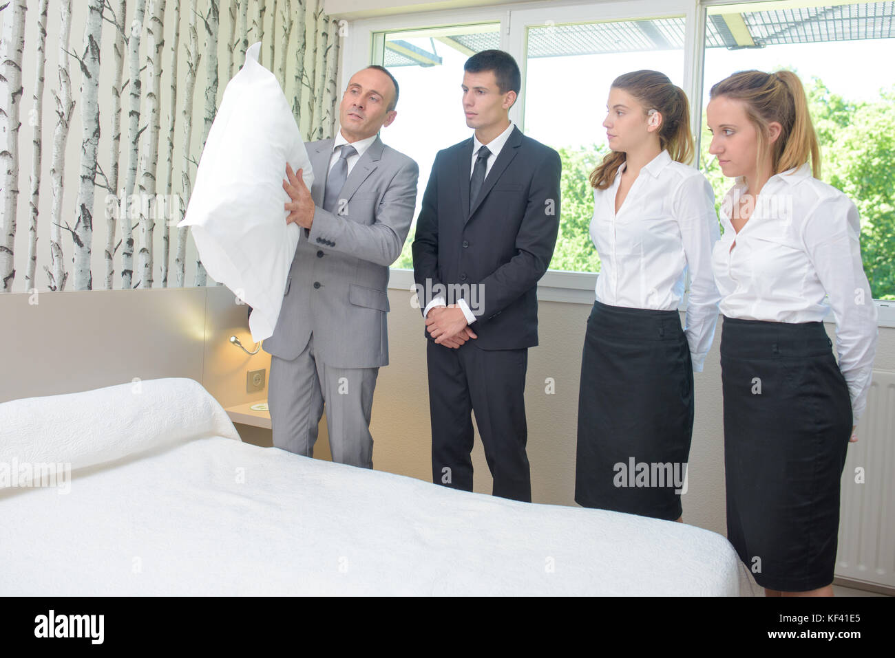 Hotel manager reception desk bell hi-res stock photography and images ...