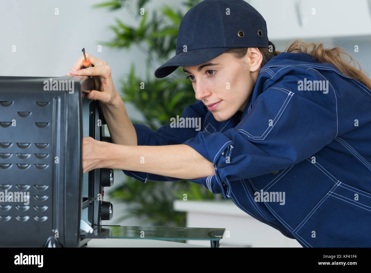 small oven technician Stock Photo - Alamy