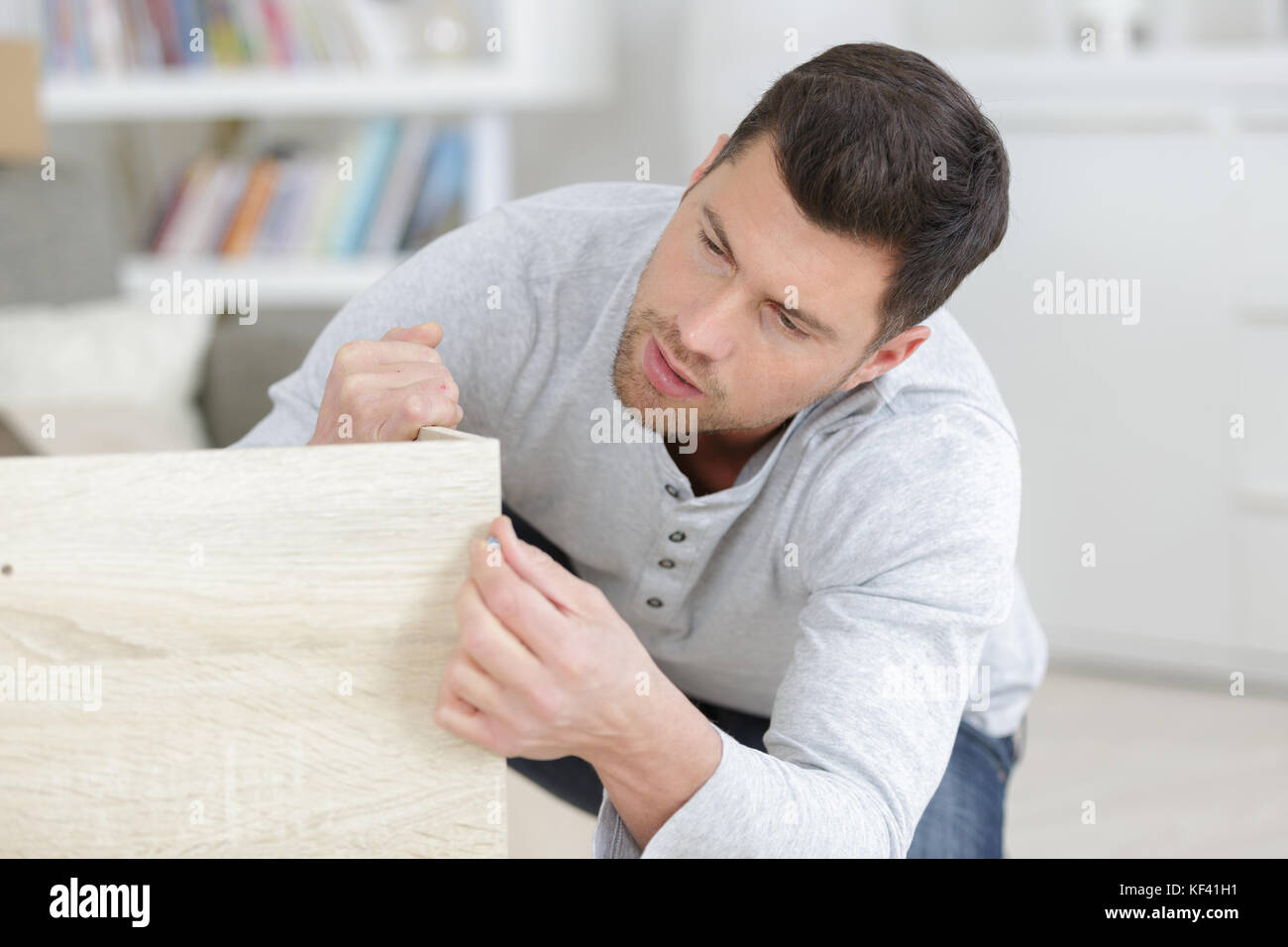 young man diy at home Stock Photo - Alamy