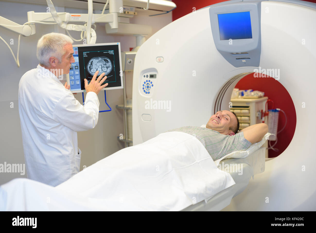 Smiling patient having brain scan Stock Photo - Alamy