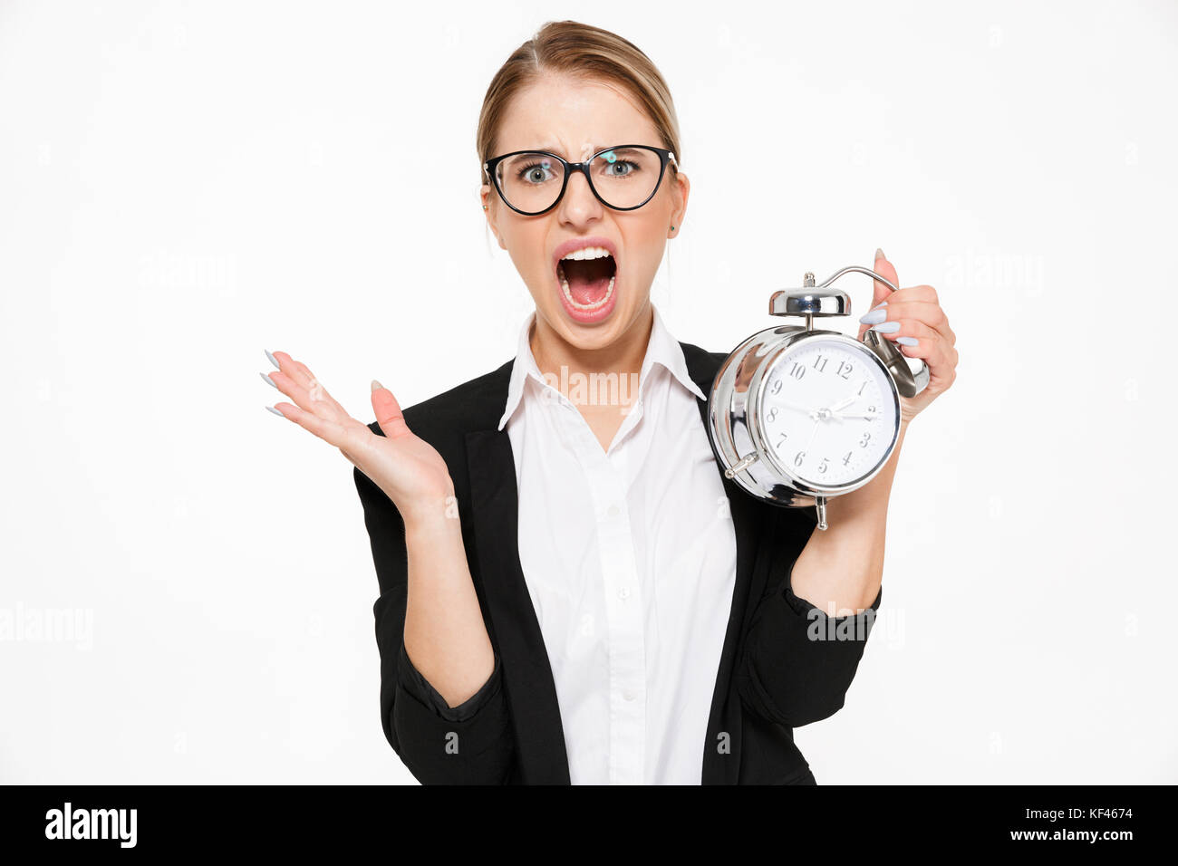 Screaming blonde business woman in eyeglasses is late while holding ...