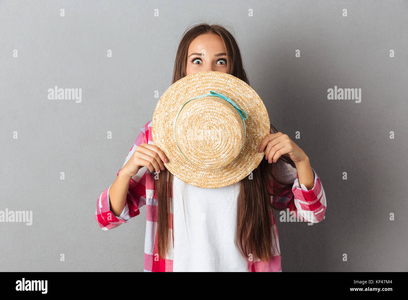 Woman face behind hat hi-res stock photography and images - Alamy