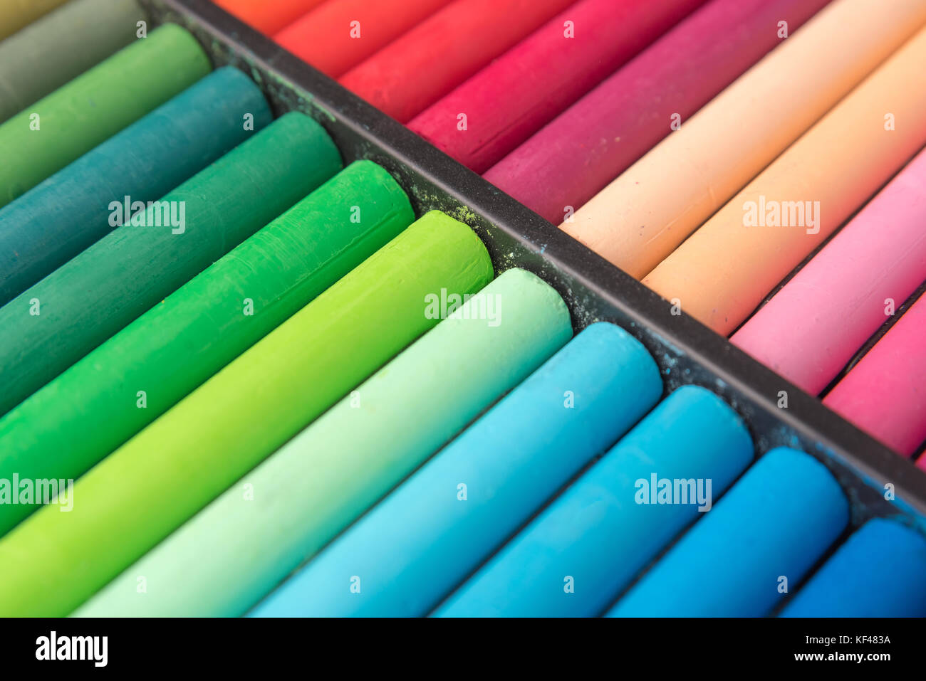 Close-up image of colorful chalk pastels in box Stock Photo - Alamy