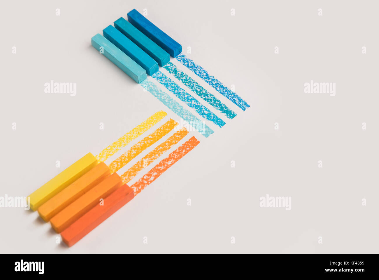 Close up of color pastel crayon chalks over its own trace line ...