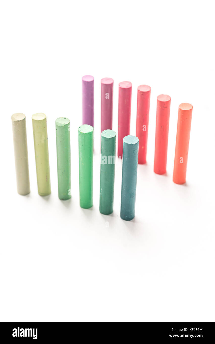 Bunch of standing colorful pastel chalks with color gradation, over ...
