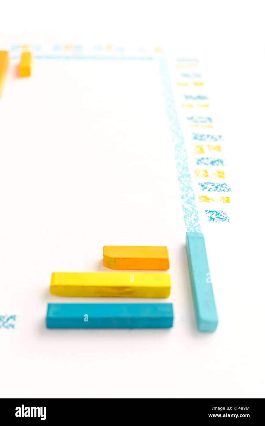 Cropped photo of color chalk drawing as striped line on white paper ...