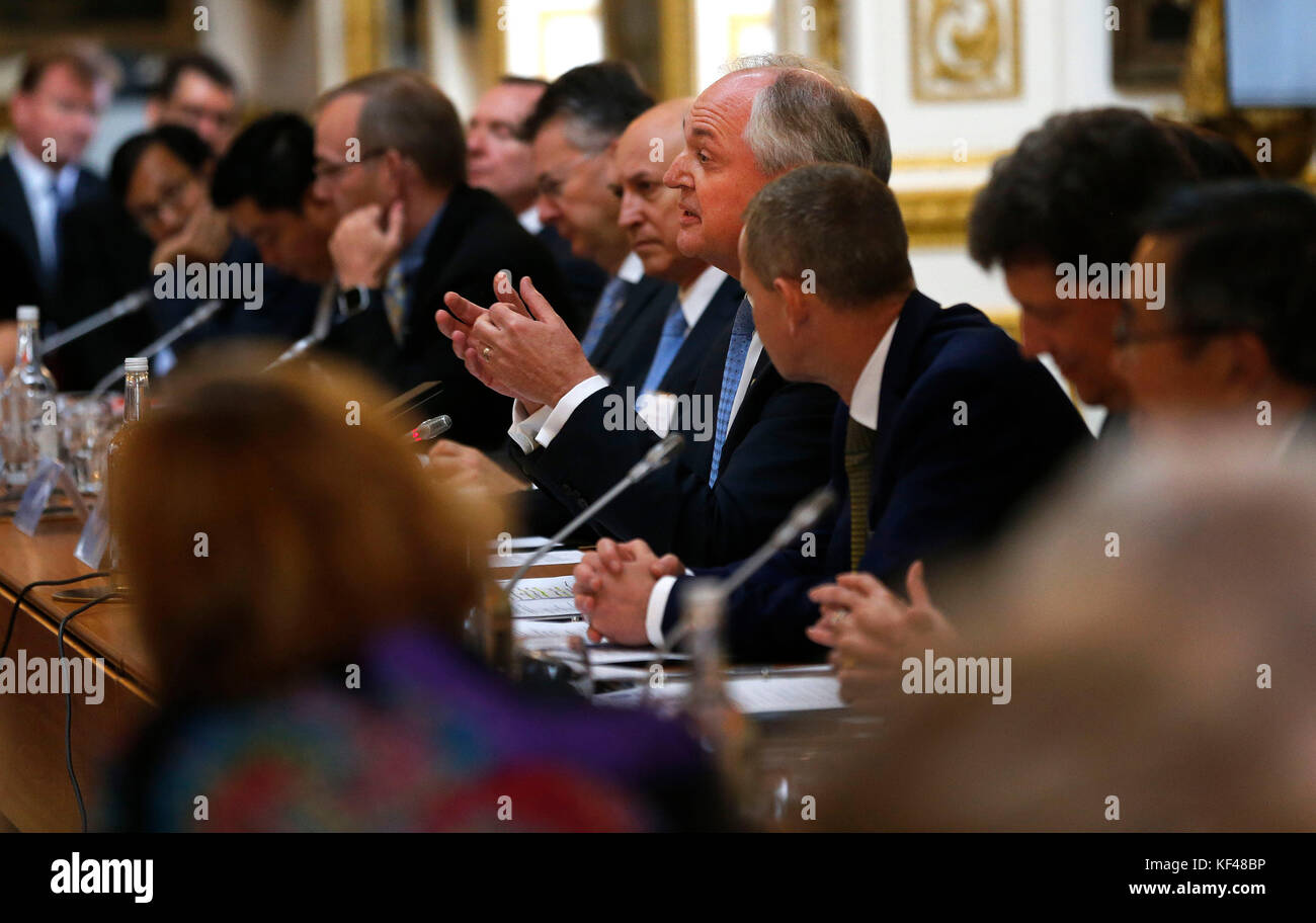 Unilever CEO Paul Polman (centre) speaks as he attends a meeting with ...