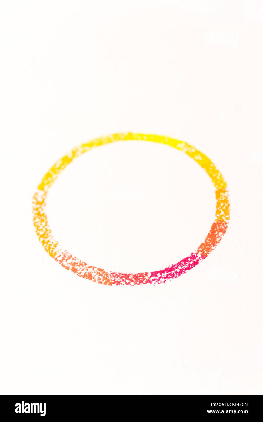 Close up photo of circle drawn with pastels chalks, with red to yellow ...