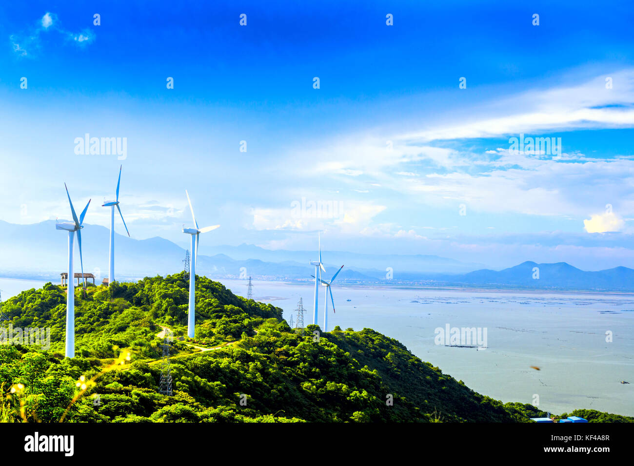 Windmill powered by wind energy Stock Photo - Alamy