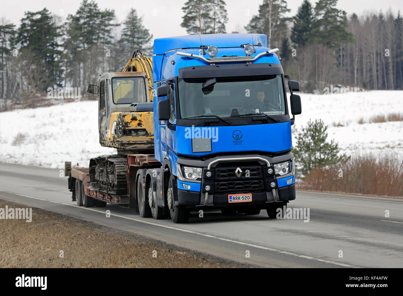 KARJAA, FINLAND – MARCH 5, 2016: Blue Renault Trucks T hauls tracked ...