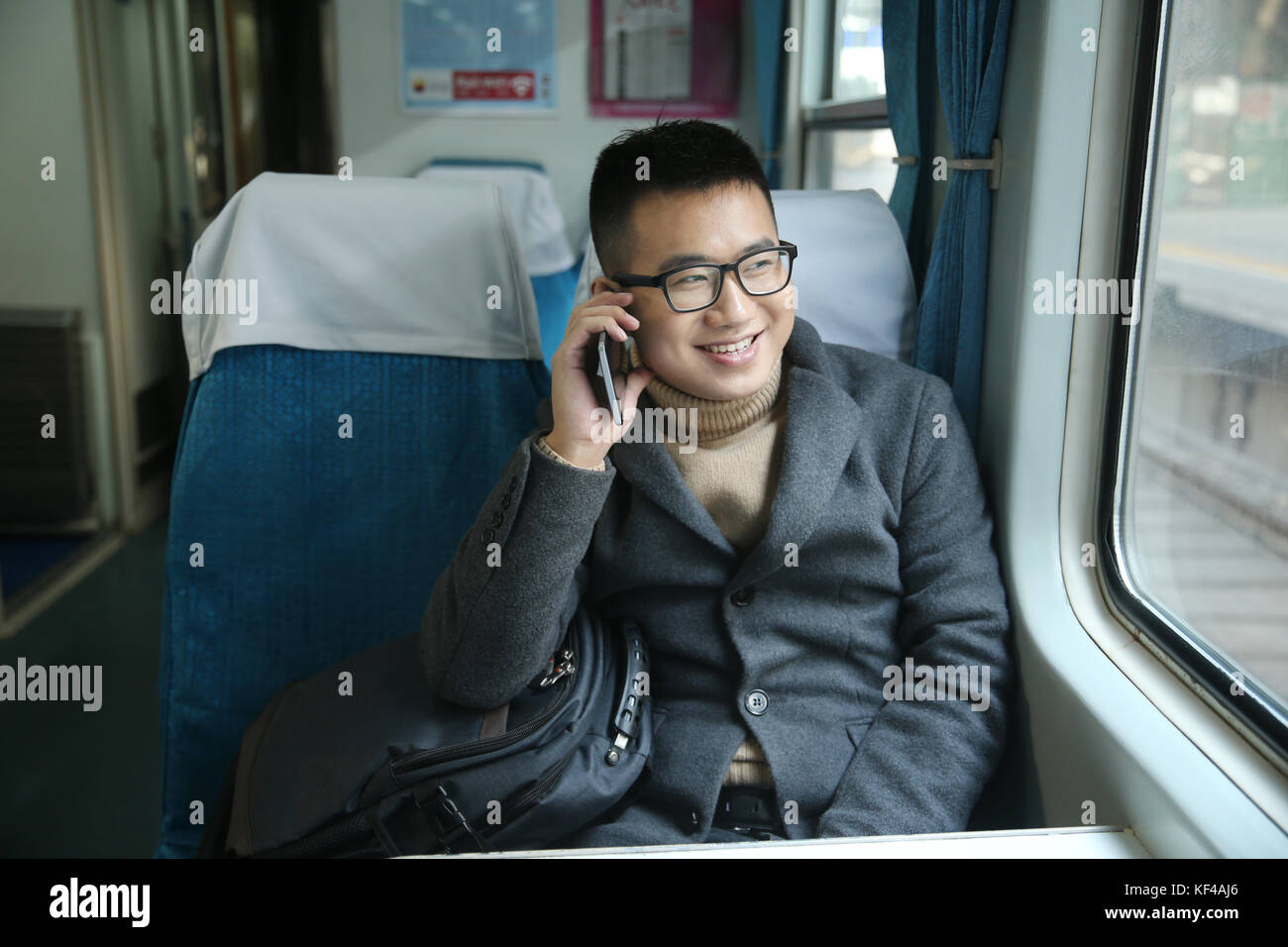 Young men on the train Stock Photo - Alamy