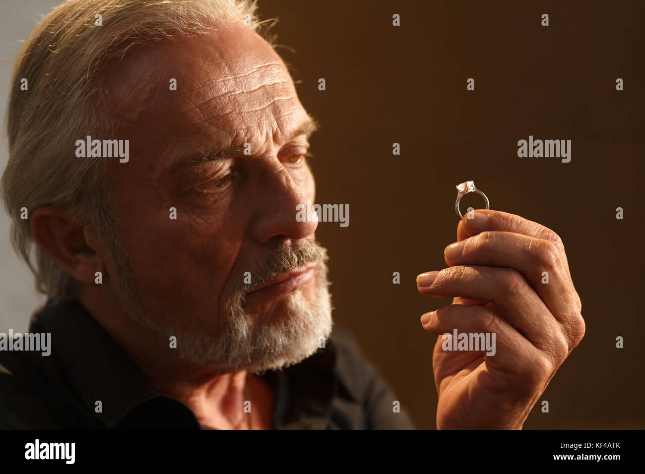 Old man with diamond ring Stock Photo - Alamy