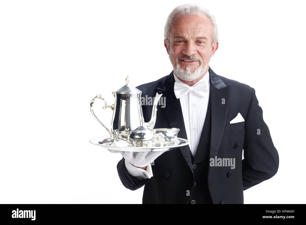 A waiter was holding a silver cutlery Stock Photo - Alamy