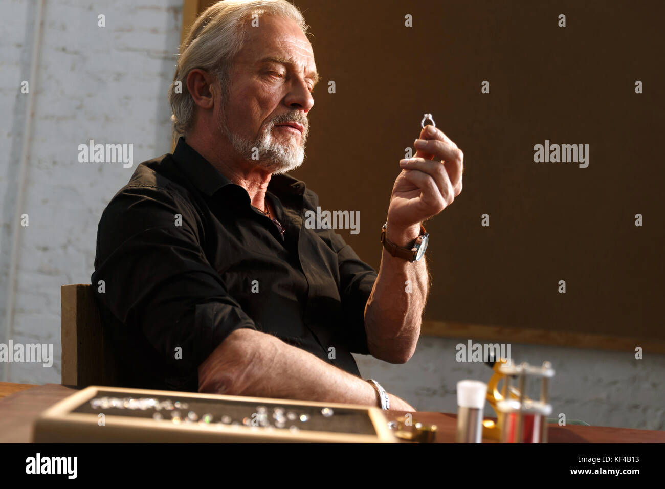 Old man with diamond ring Stock Photo - Alamy