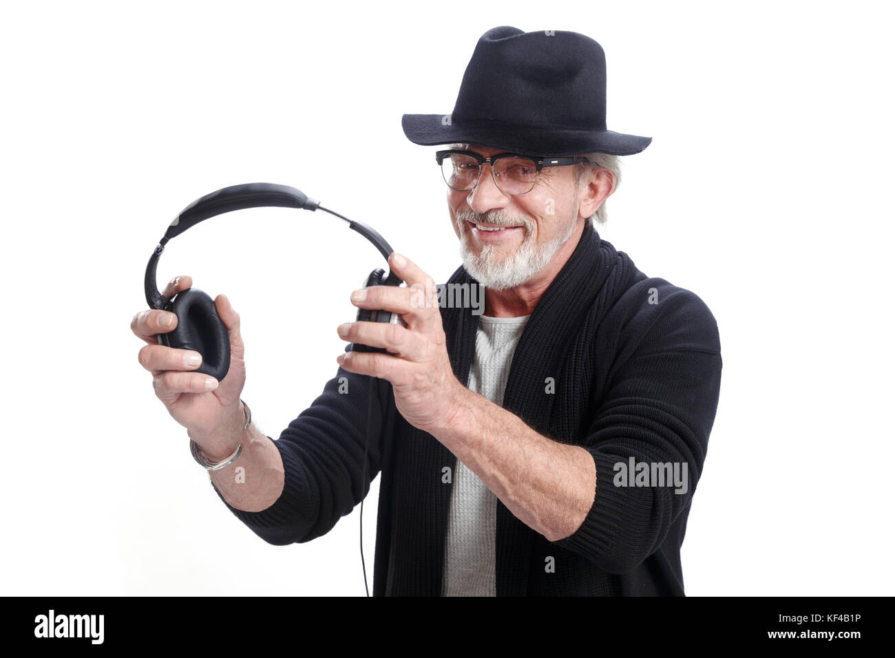 Old man with headphones Stock Photo - Alamy
