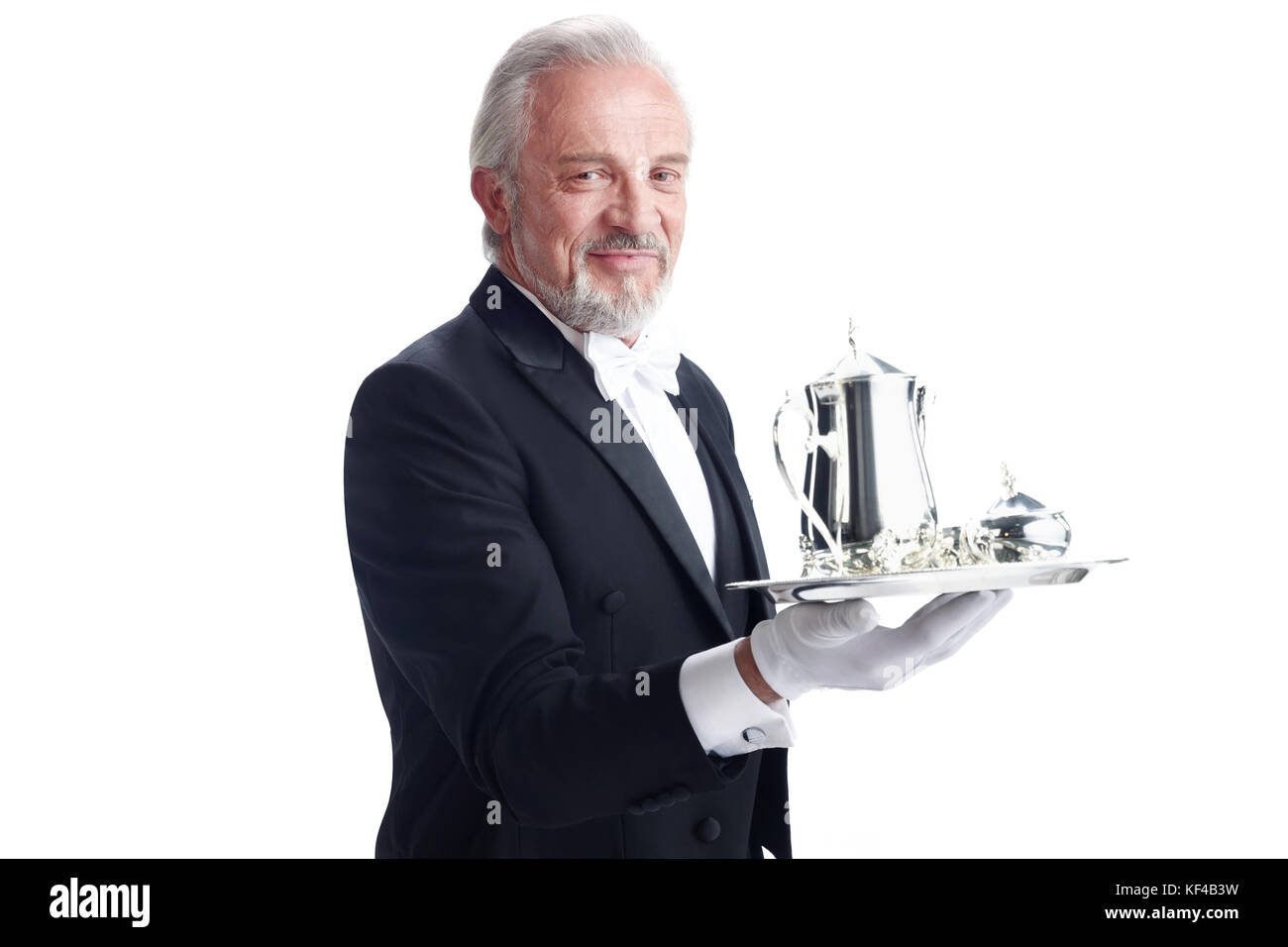 A waiter was holding a silver cutlery Stock Photo - Alamy
