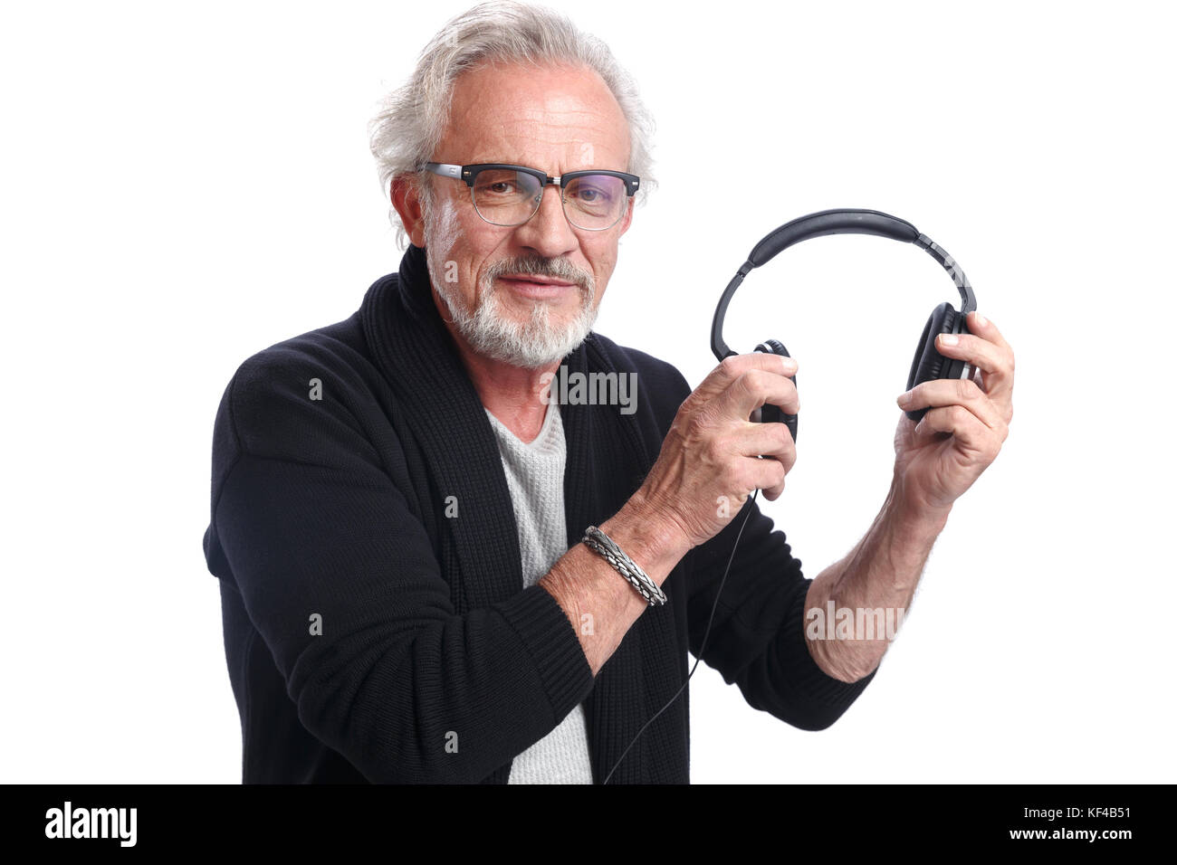 Old man with headphones Stock Photo - Alamy