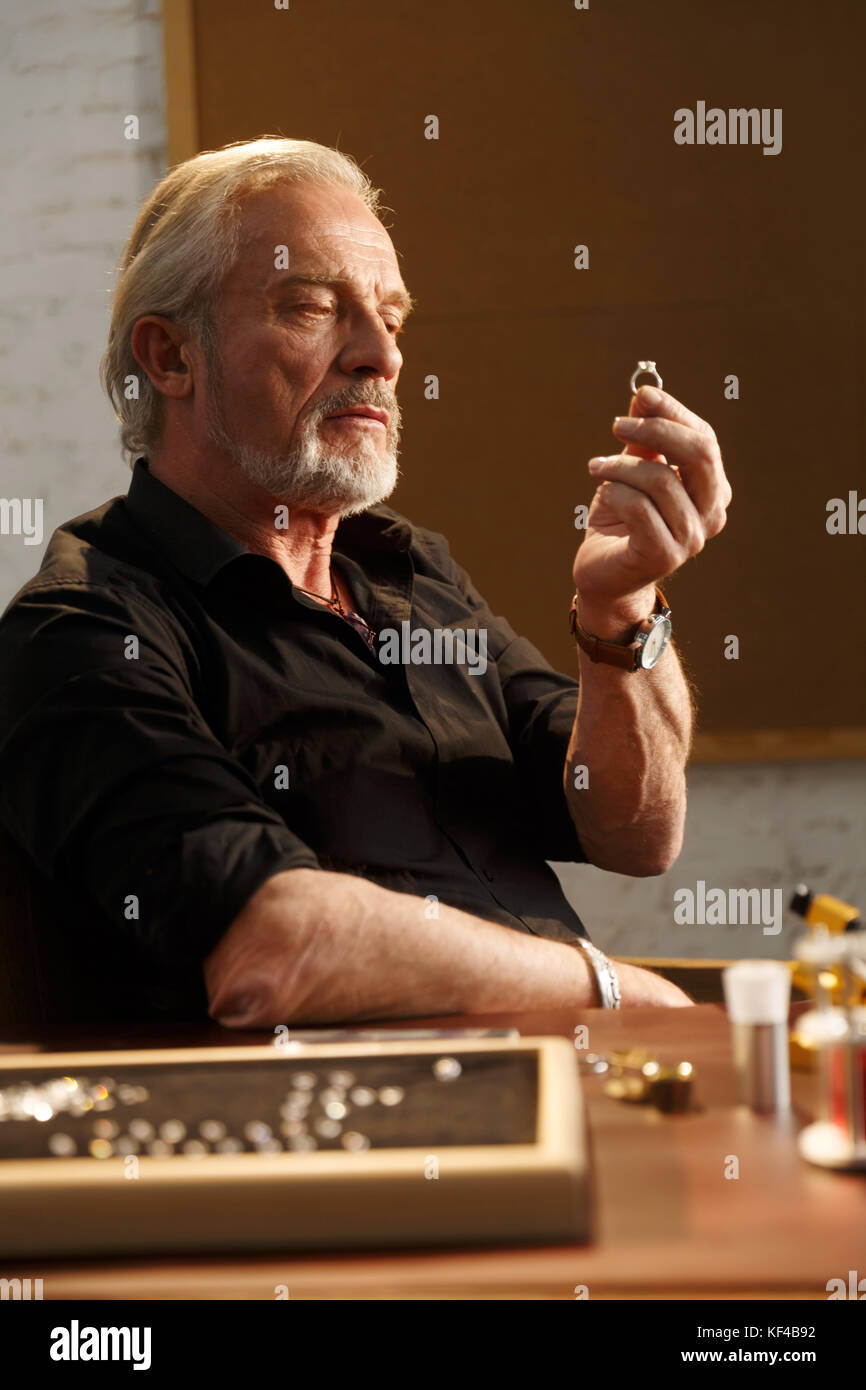 Old man with diamond ring Stock Photo - Alamy