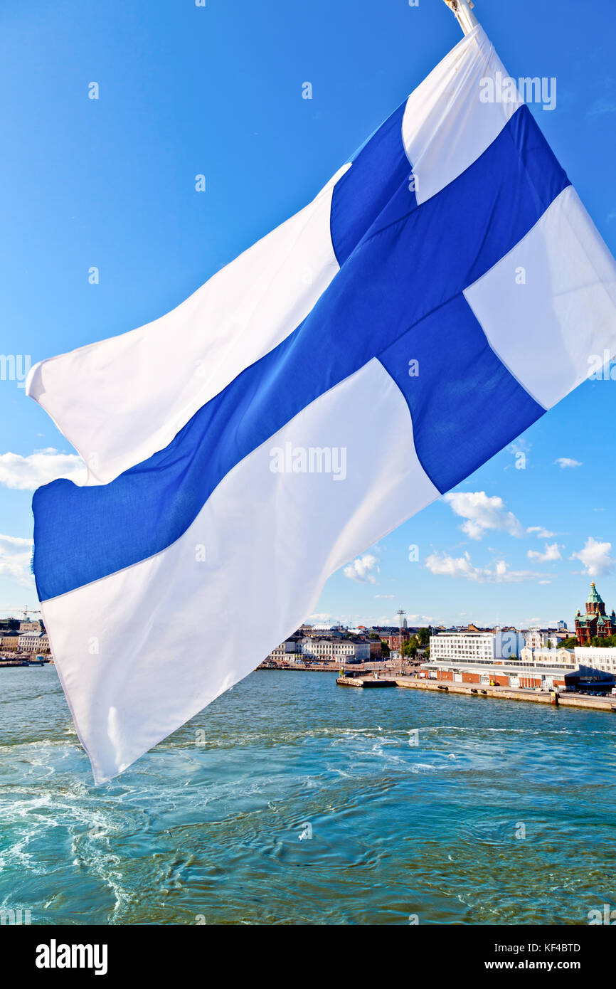 Flag of Finland against Helsinki cityscape Stock Photo - Alamy