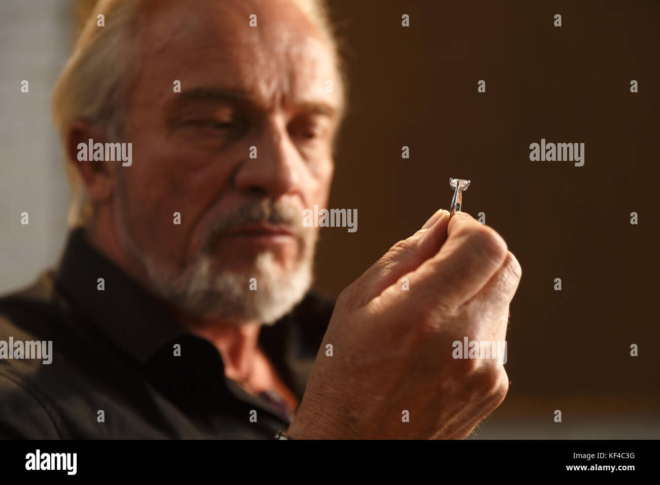 Old man with diamond ring Stock Photo - Alamy