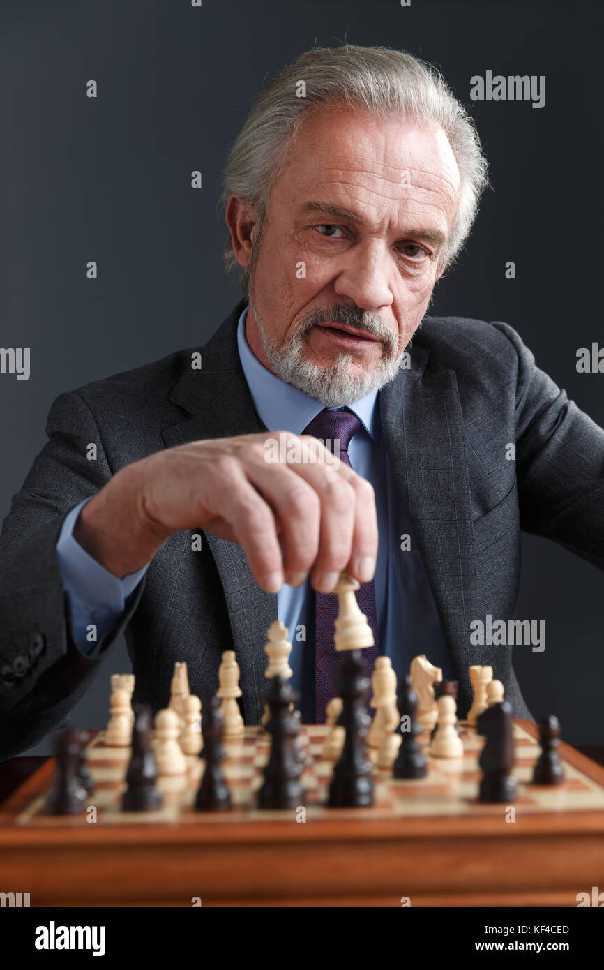 Old men playing chess Stock Photo - Alamy