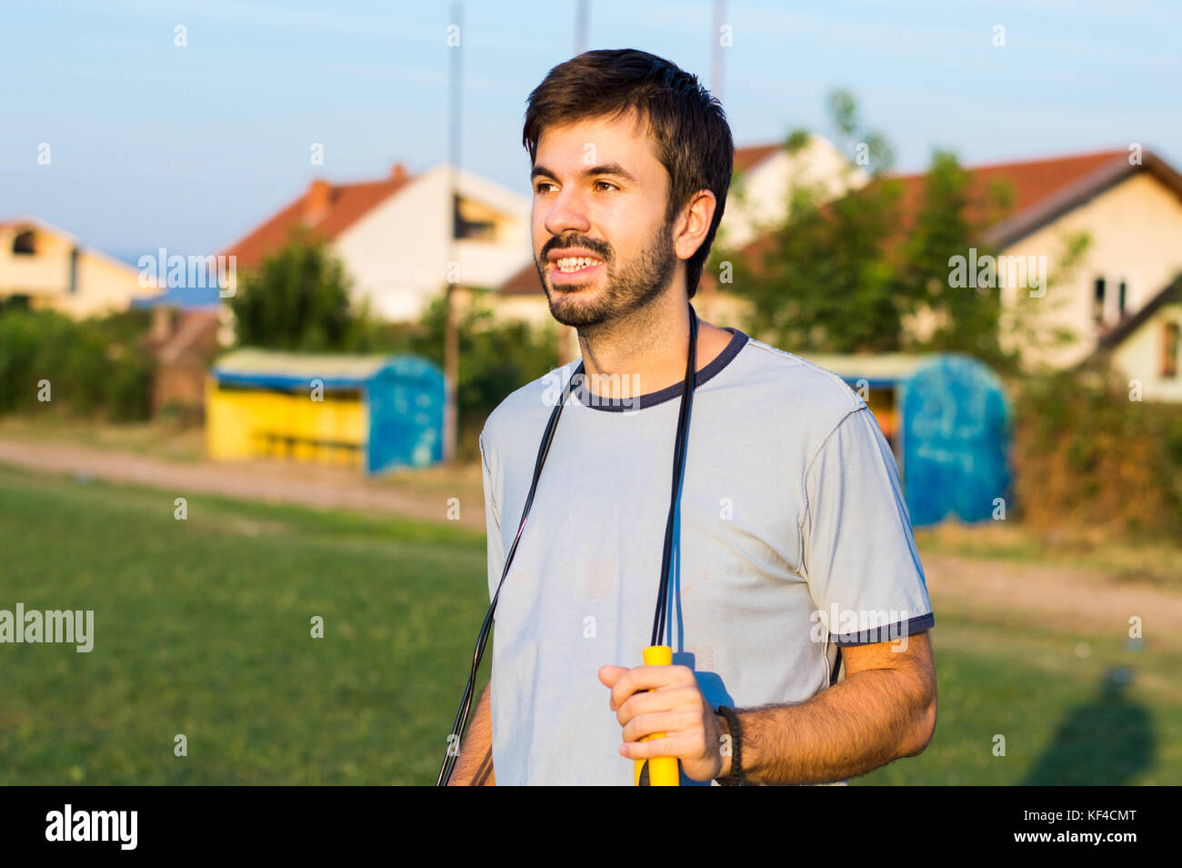Man exercising with jumping rope at a stadium Stock Photo - Alamy