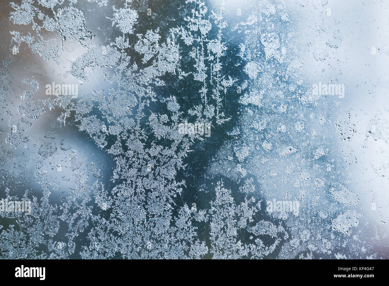 Frost over window glass, close up abstract background photo texture ...