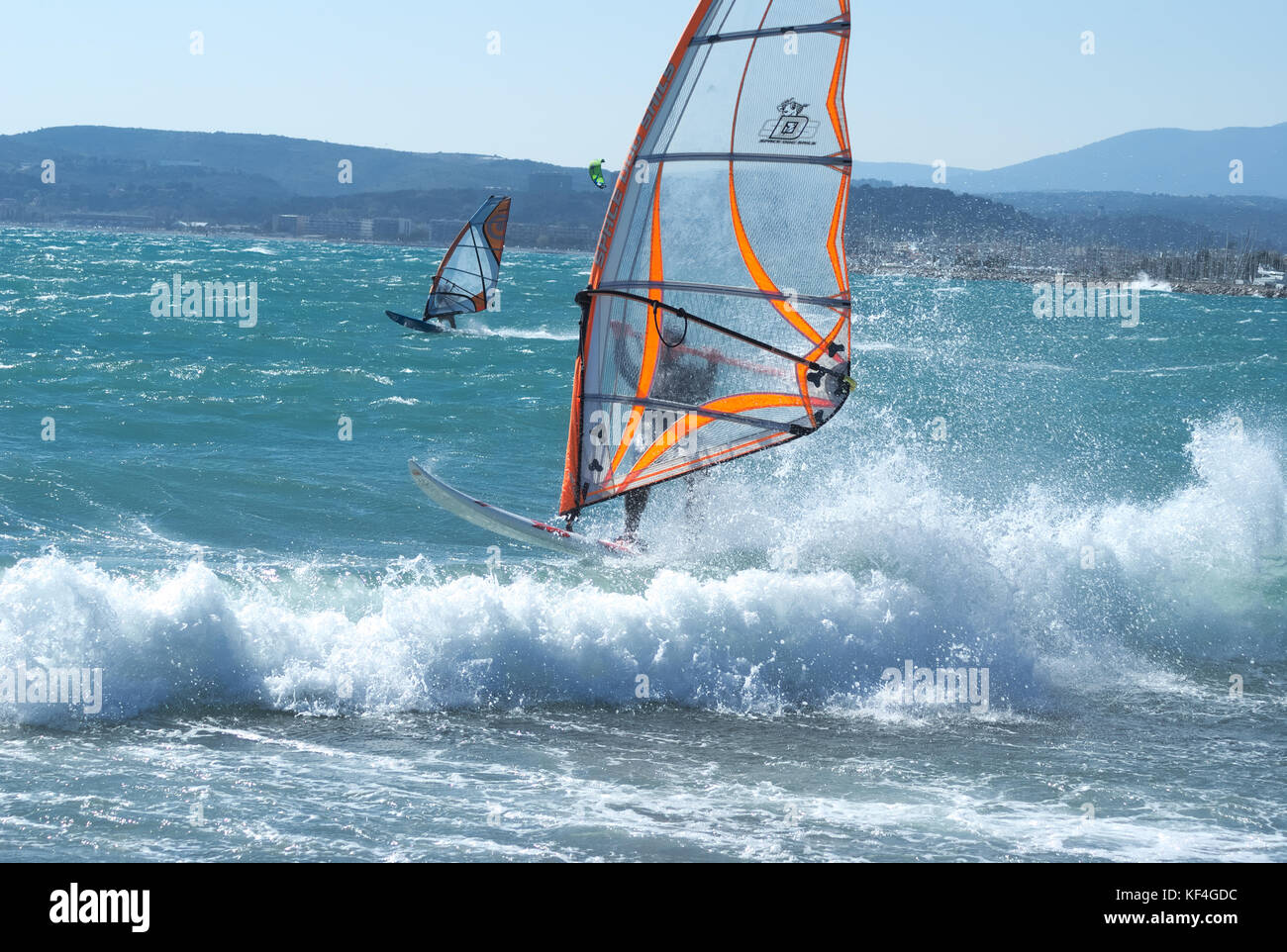 Windboarder at full speed during a windy day in Mediterranean sea Stock ...