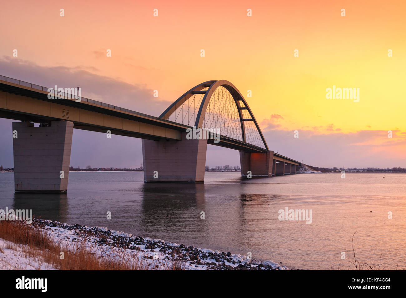 Fehmarnsundbrücke or Fehmarn Sound Bridge in winter sunset Stock Photo ...
