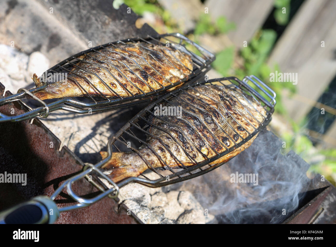 Fish grill / Toasted fish / Fried fish Stock Photo - Alamy