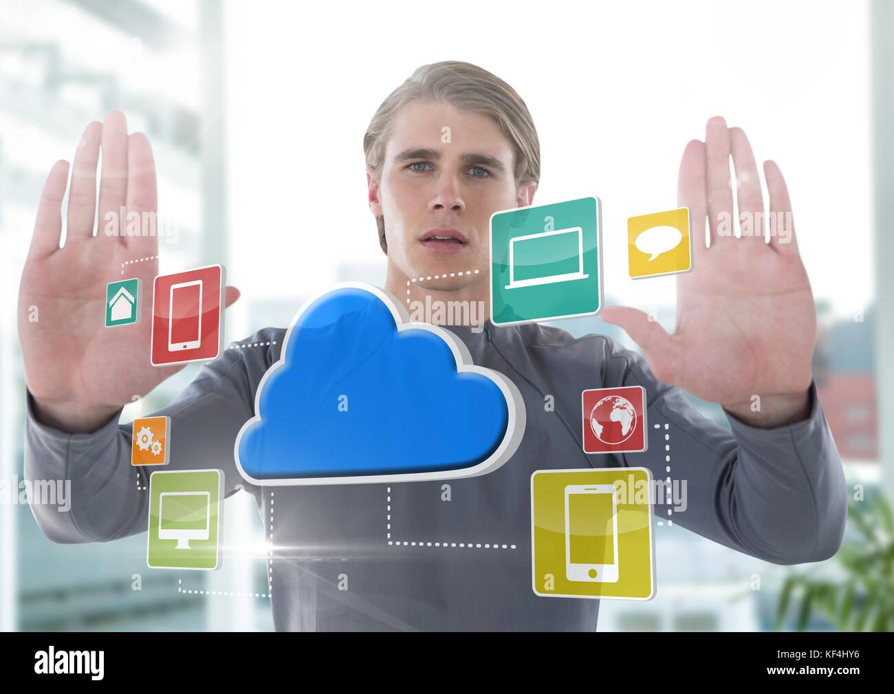 Digital composite of App icons and Businessman holding hands up in ...