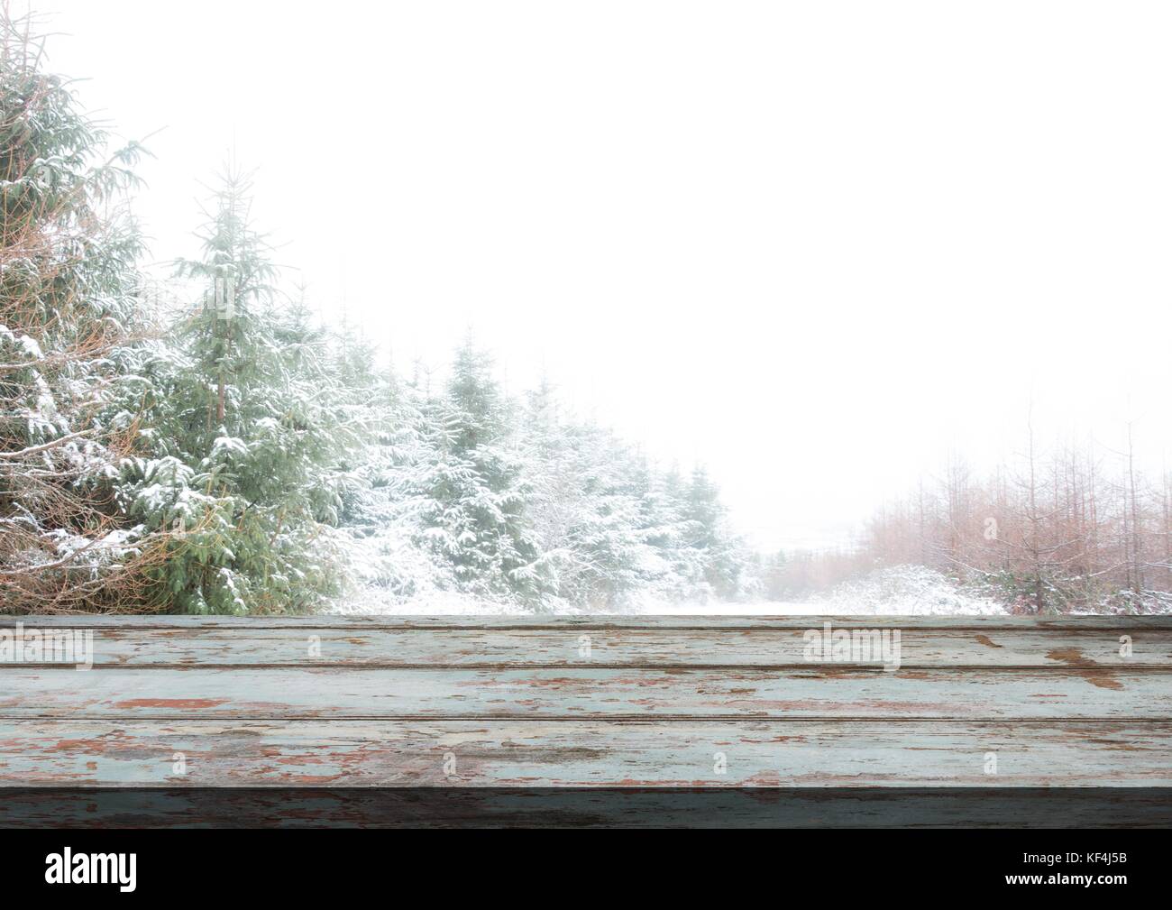 Digital composite of Wooden floor with Winter snow theme background ...