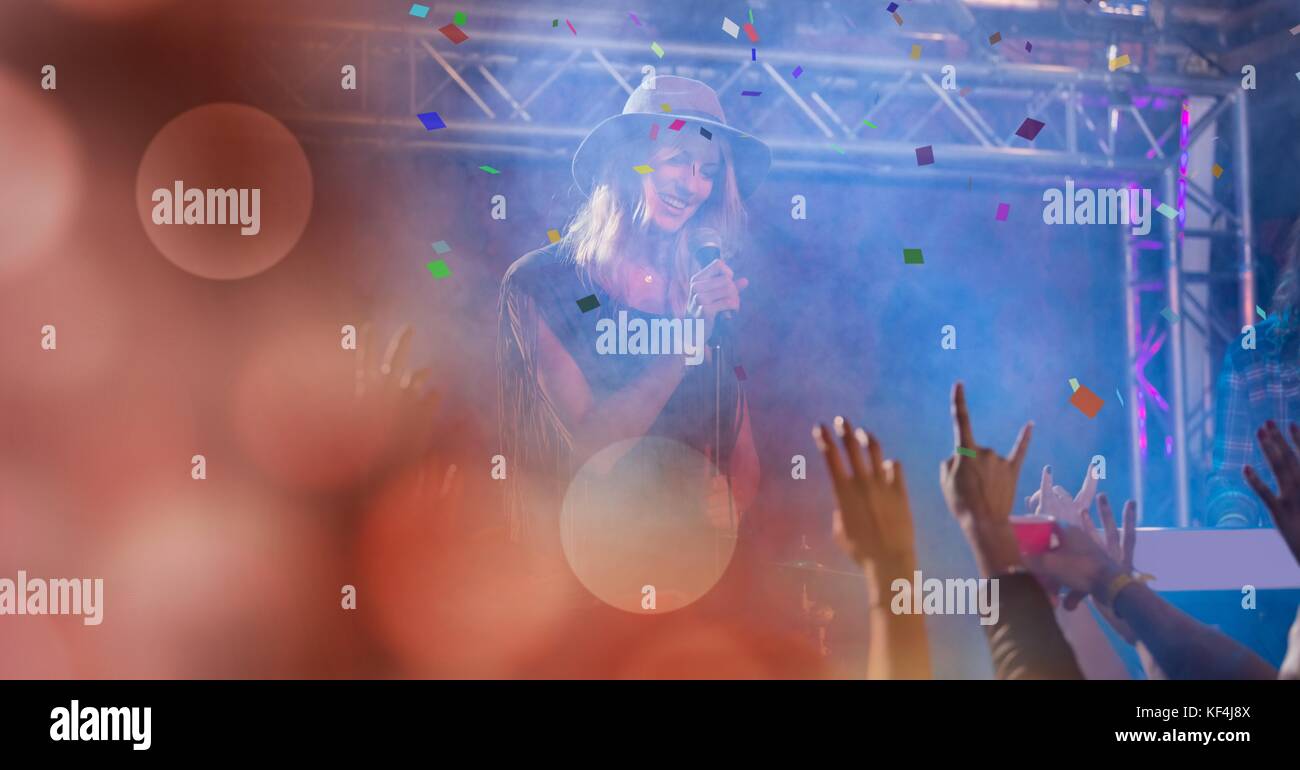 Digital composite of girl singing at concert with transition Stock ...