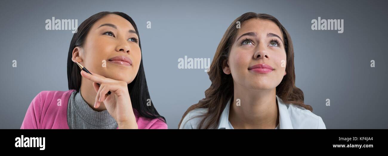 Digital composite of Two women looking with grey background Stock Photo ...