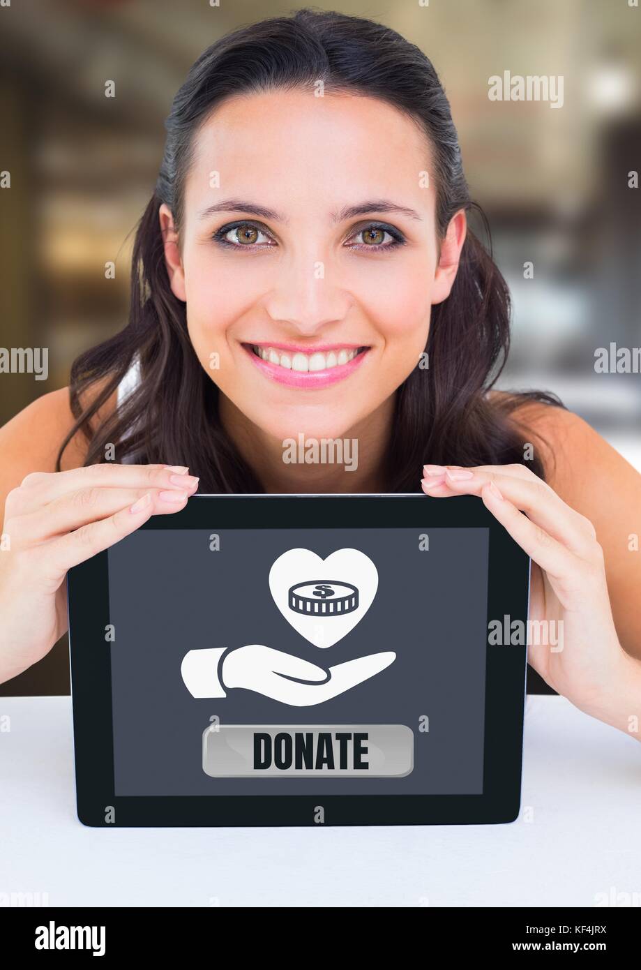 Digital composite of Woman holding tablet with donate button and hand ...