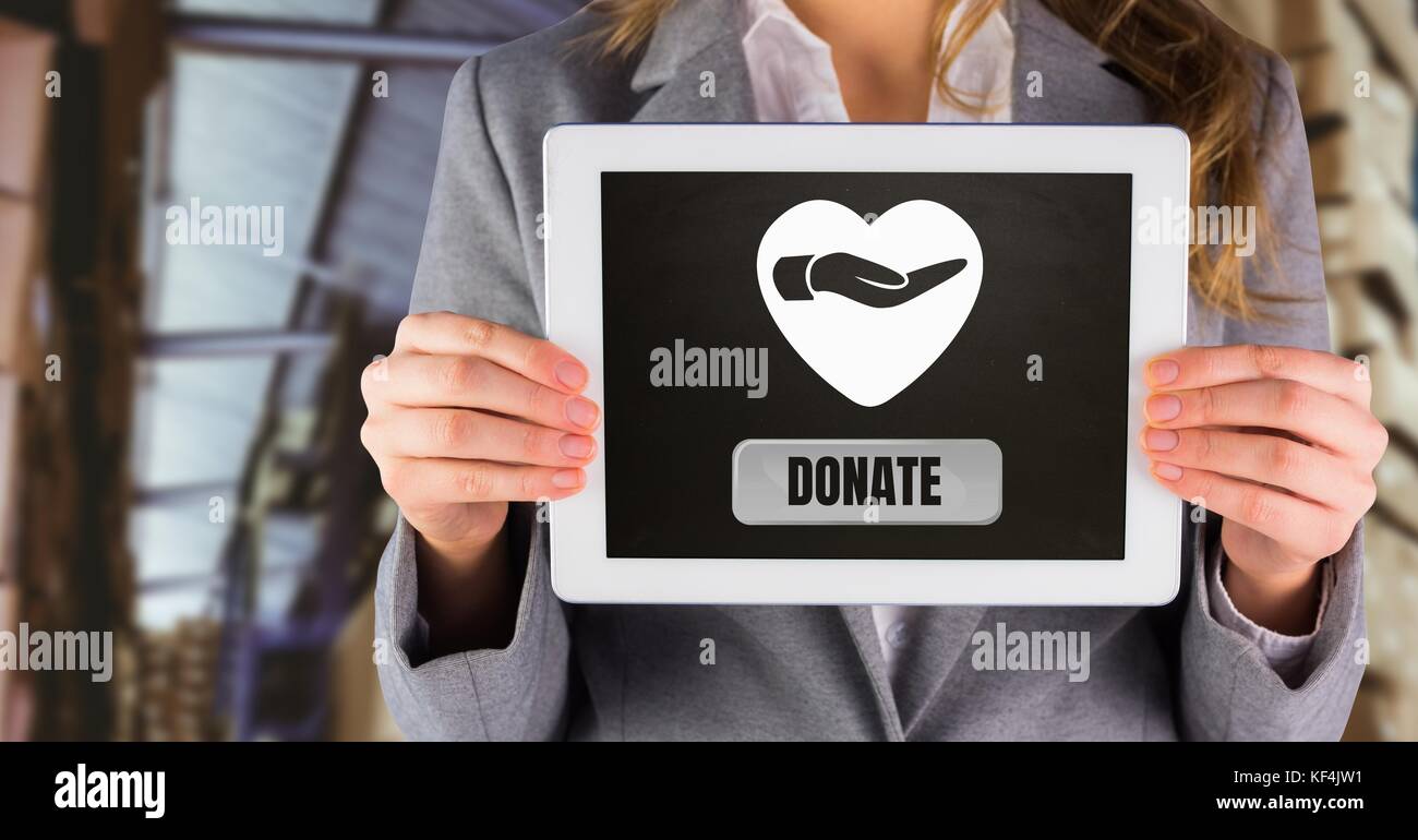 Digital composite of Woman holding tablet with donate button and hand ...