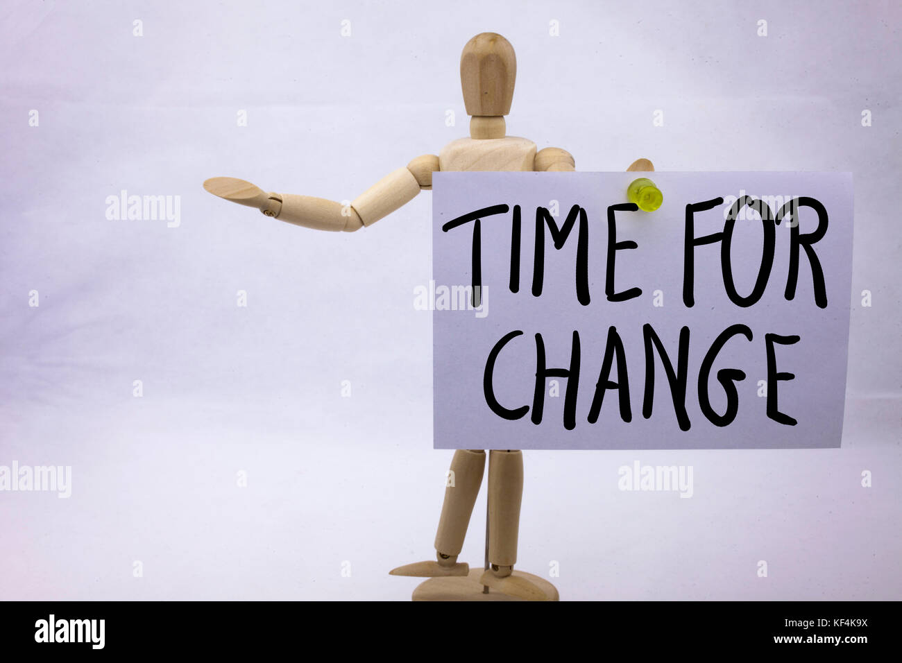 A yellow sticky note post it writing, caption, inscription Time For ...