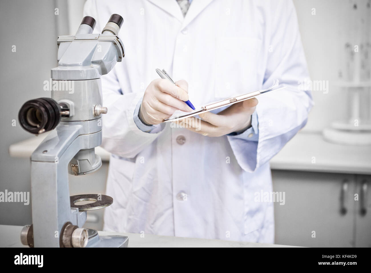 Scientist working in laboratory looking results Stock Photo - Alamy