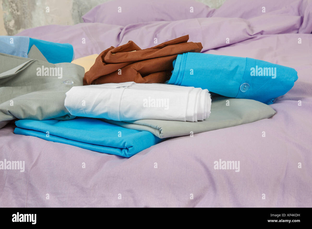 stacks colourful bed linen textiles clothing background pile concept ...