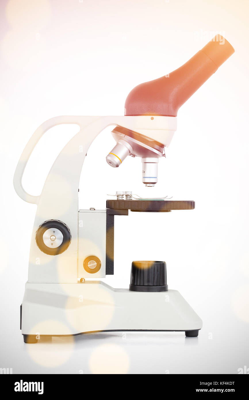Microscope on white background Stock Photo - Alamy