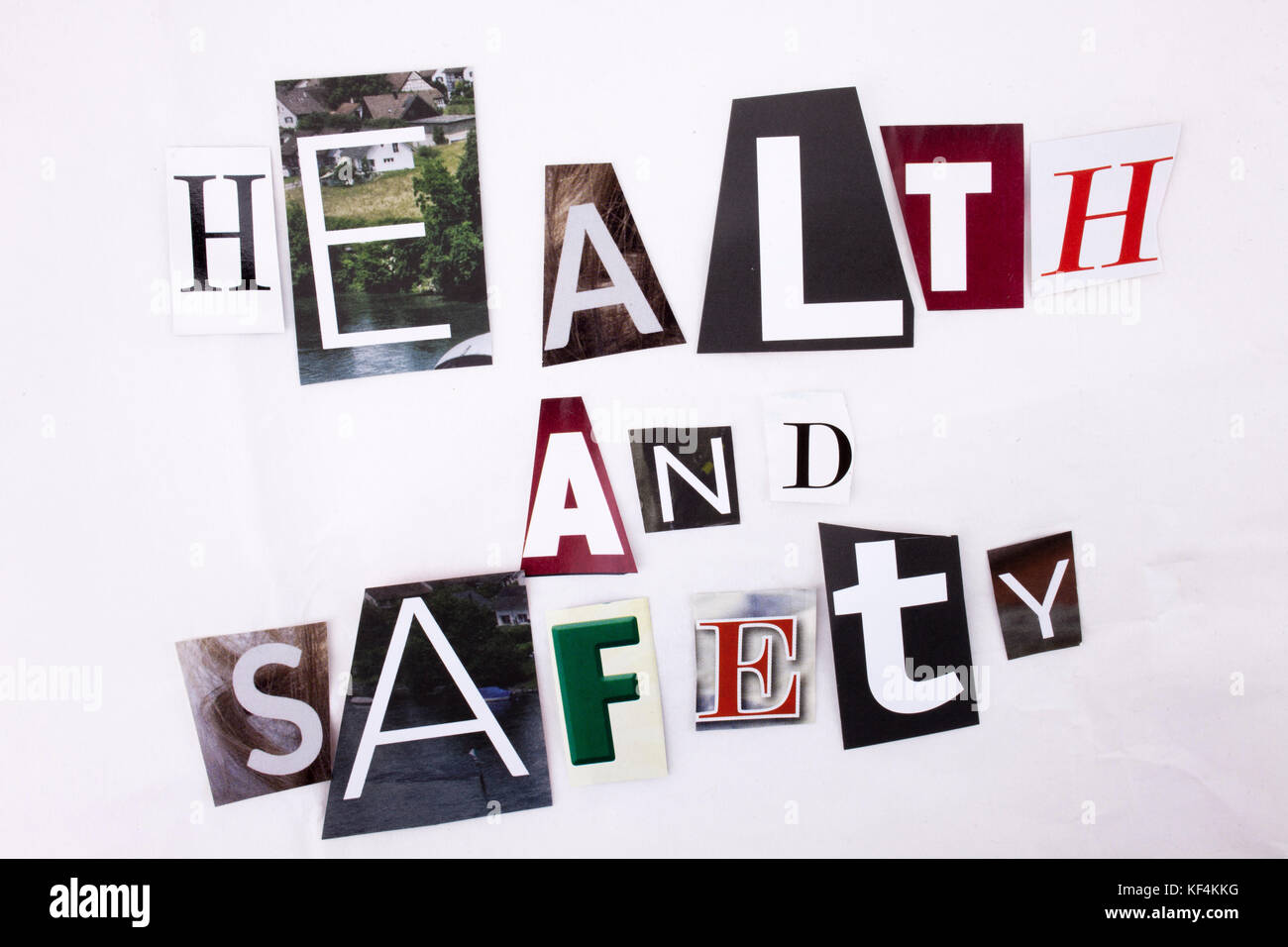 Closeup of a hand writing a message word writing HEALTH and Safety made ...