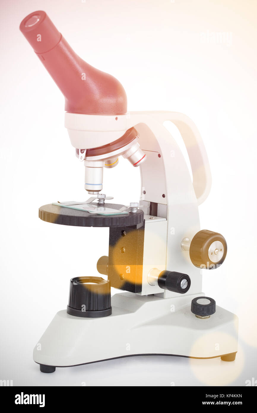 Microscope on white background Stock Photo - Alamy