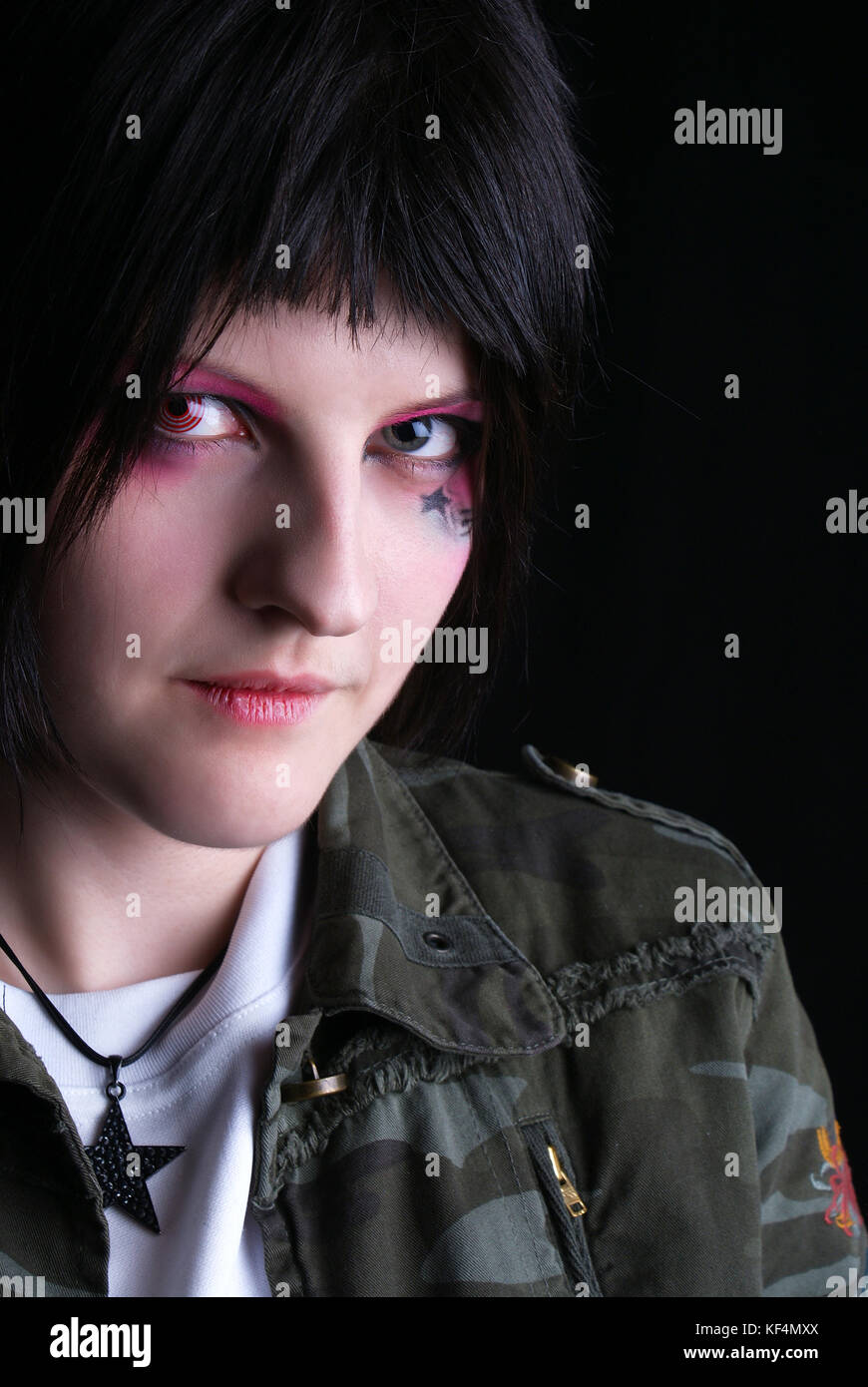 pretty girl with colored eyes posing in the style of cosplay.Isolated ...