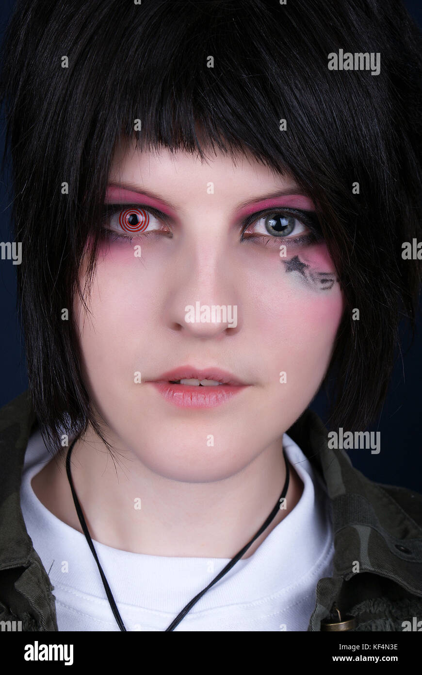 pretty girl with colored eyes posing in the style of cosplay.Isolated ...