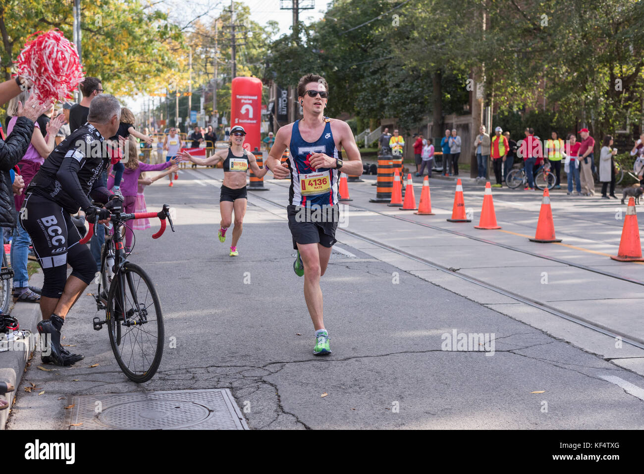 TORONTO, ON/CANADA - OCT 22, 2017: Marathon runners passing the 33km ...